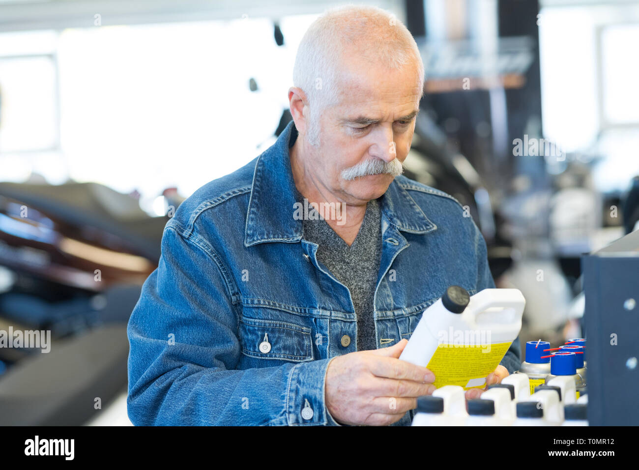 Customer choosing oil car hi-res stock photography and images - Alamy