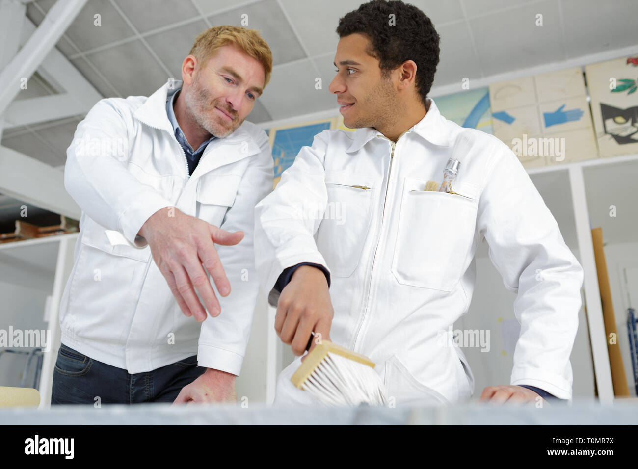 House painter and client hi-res stock photography and images - Alamy
