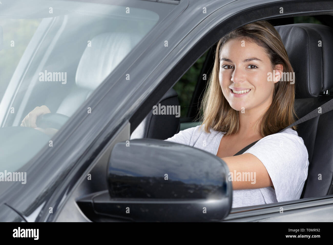 portrait of independent young female driver Stock Photo - Alamy