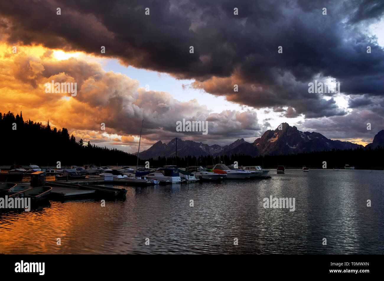Sunset over Jackson lake with Grand Tetons in the background Stock ...