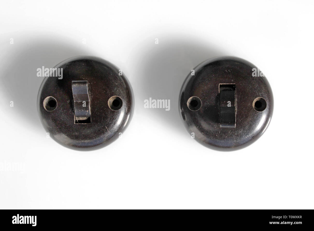 Antique two switches on-off bakelite, isolated on white background ...