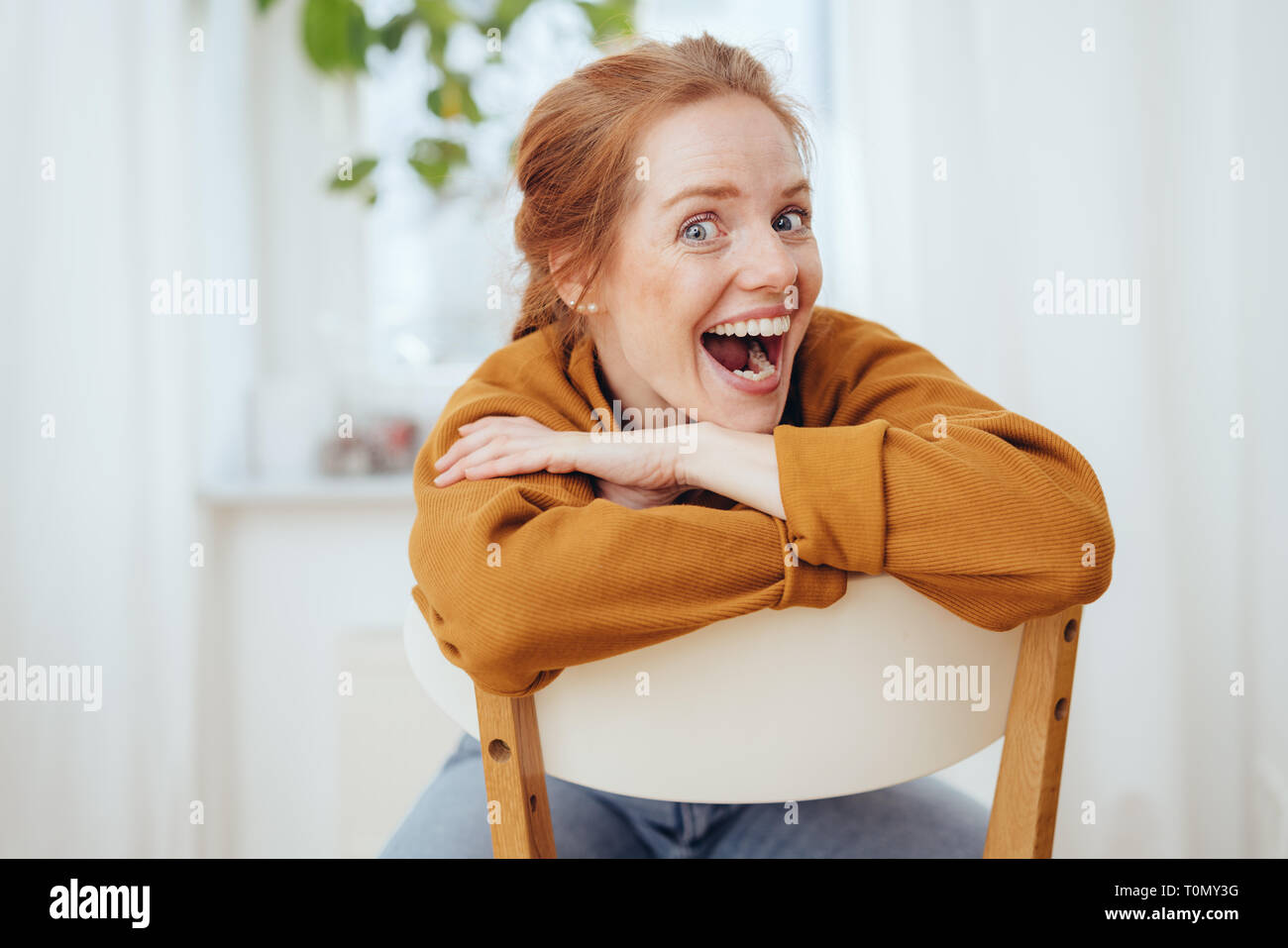 Sit sideways hi-res stock photography and images - Alamy