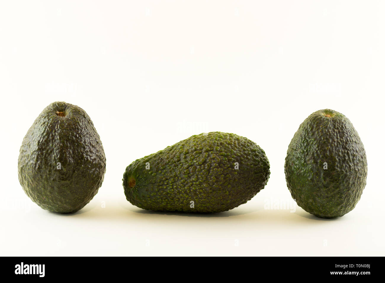 3 Three avocados isolated on white background design product label ...