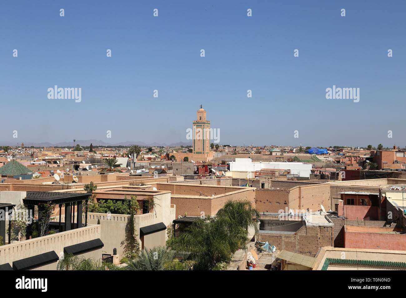 Ben Youssef Mosque and Marrakesh skyline from the Secret Garden tower ...