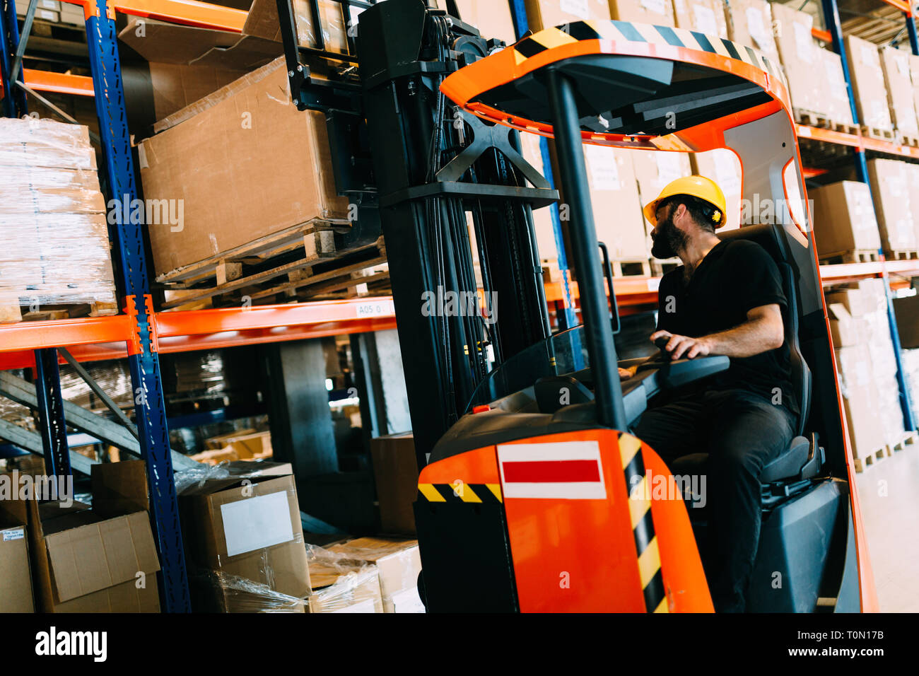 Warehouse worker loading construction hi-res stock photography and ...