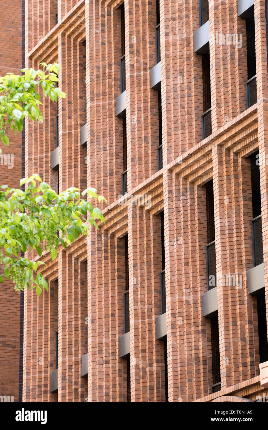 The complex intricate brickwork of this new building in Sydney blends ...