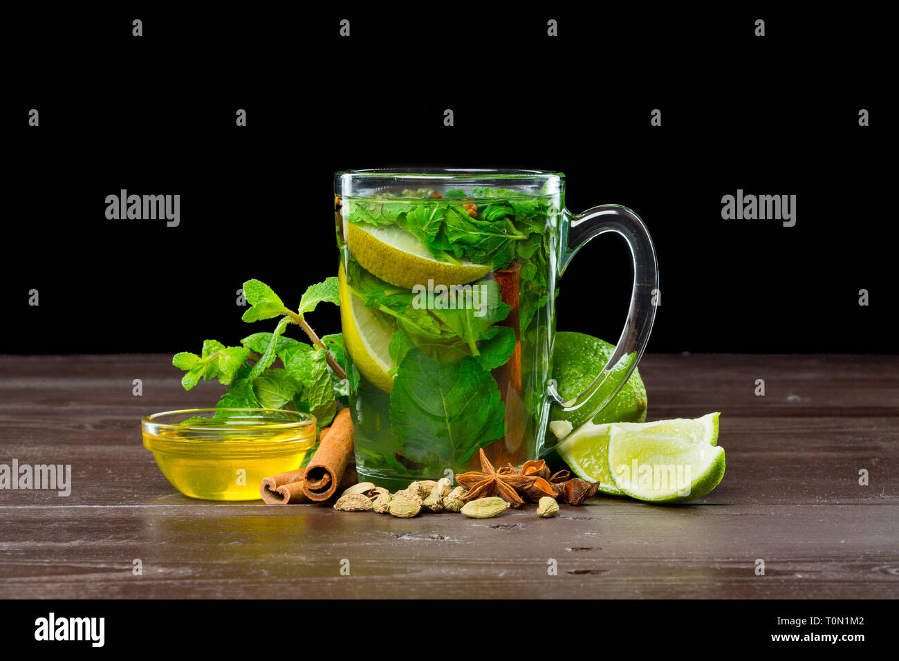 Glass of green tea with lime, lemon, mint Stock Photo - Alamy