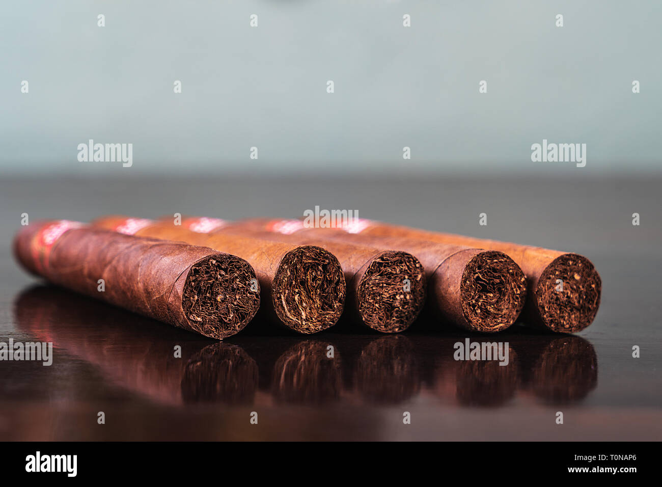 Cuban cigar on table hi-res stock photography and images - Alamy