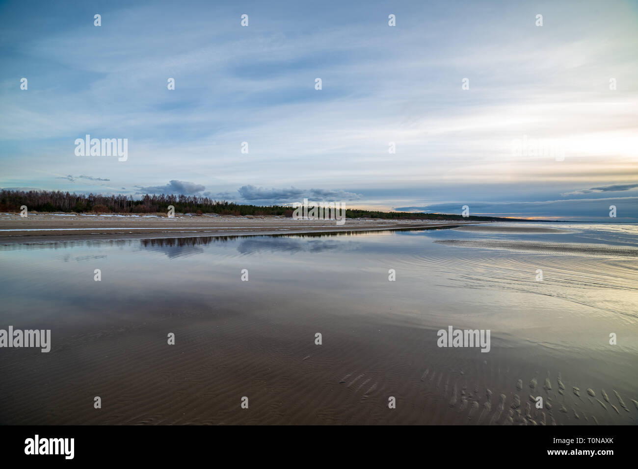 calm morning in summer on the sea beach. stretch clouds and silence for ...