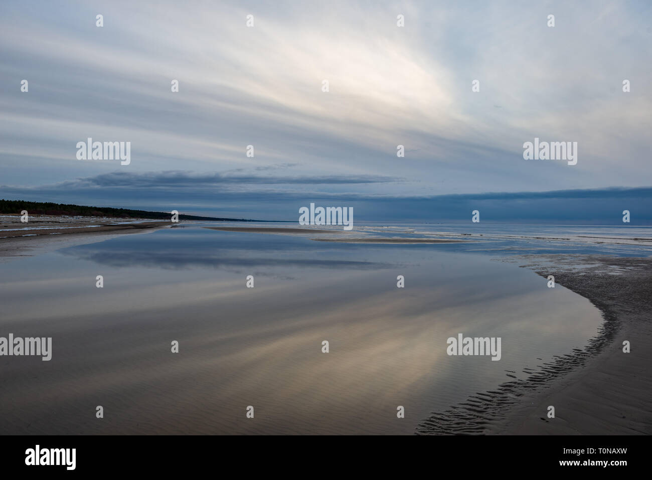 calm morning in summer on the sea beach. stretch clouds and silence for ...