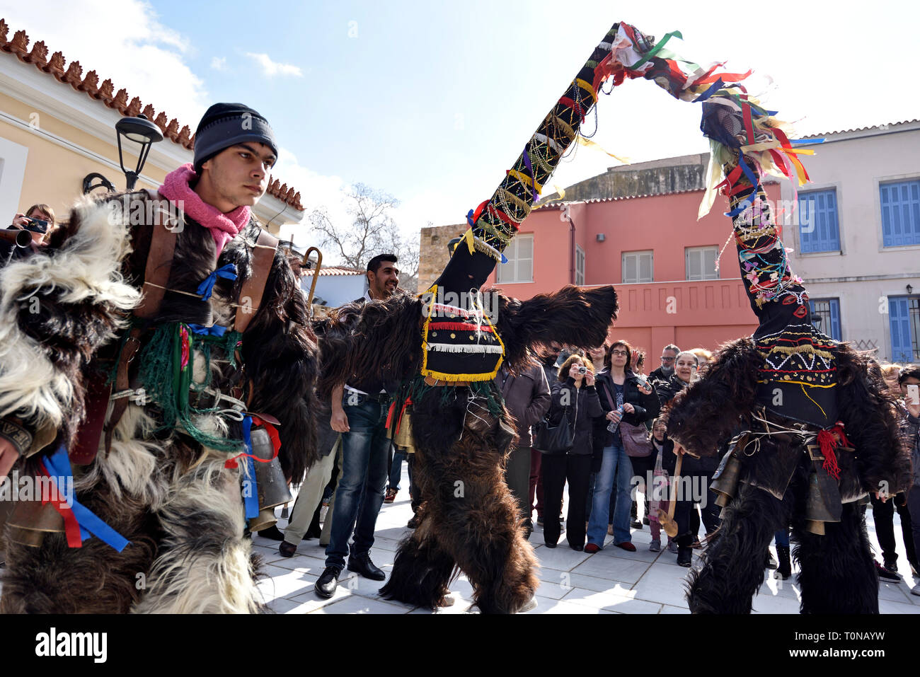 Men from Northern Greece wearing traditional costumes with bells, dance ...