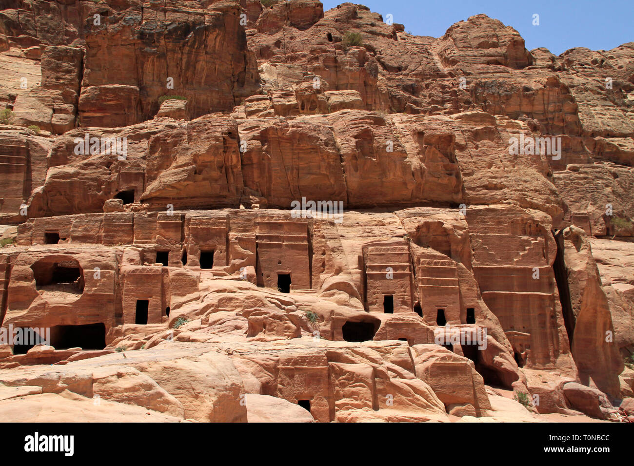 Monumental building carved out of rock in the ancient Jordanian city of ...