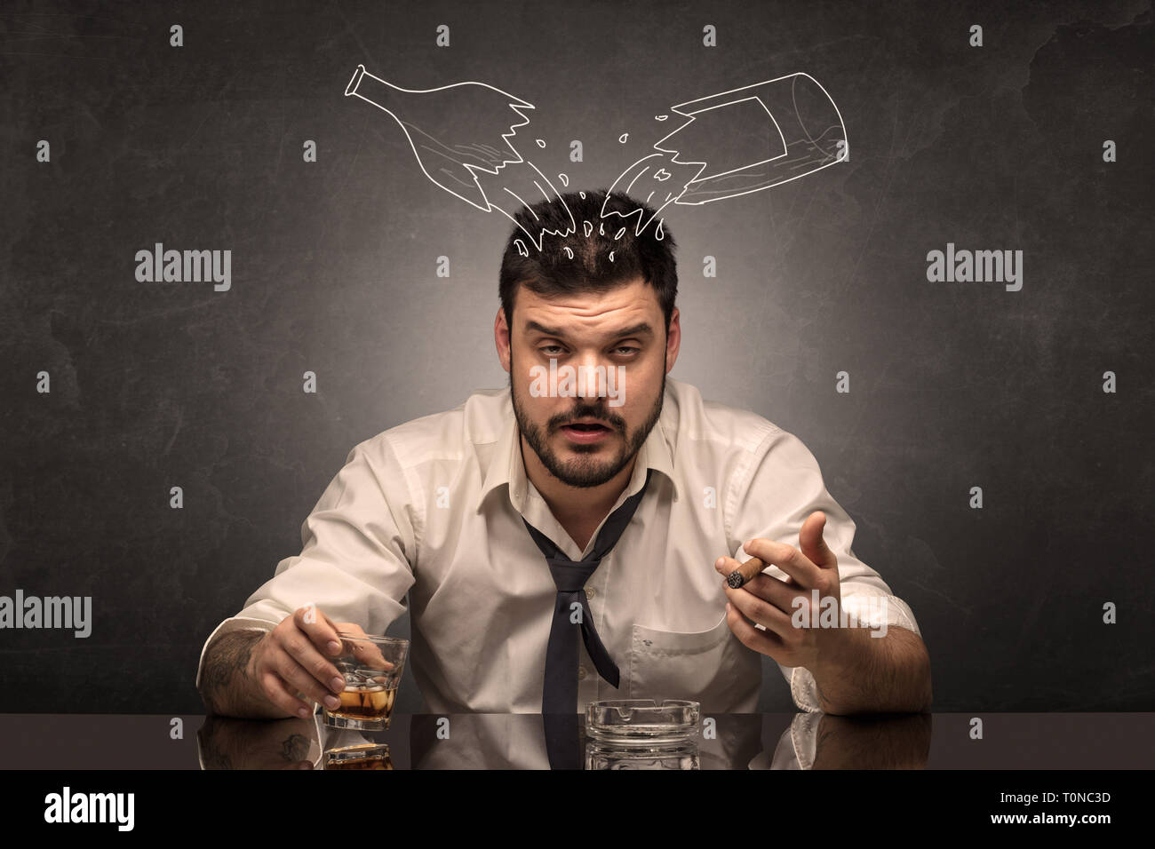 Drunk down and out man with doodle alcohol bottles concept Stock Photo ...