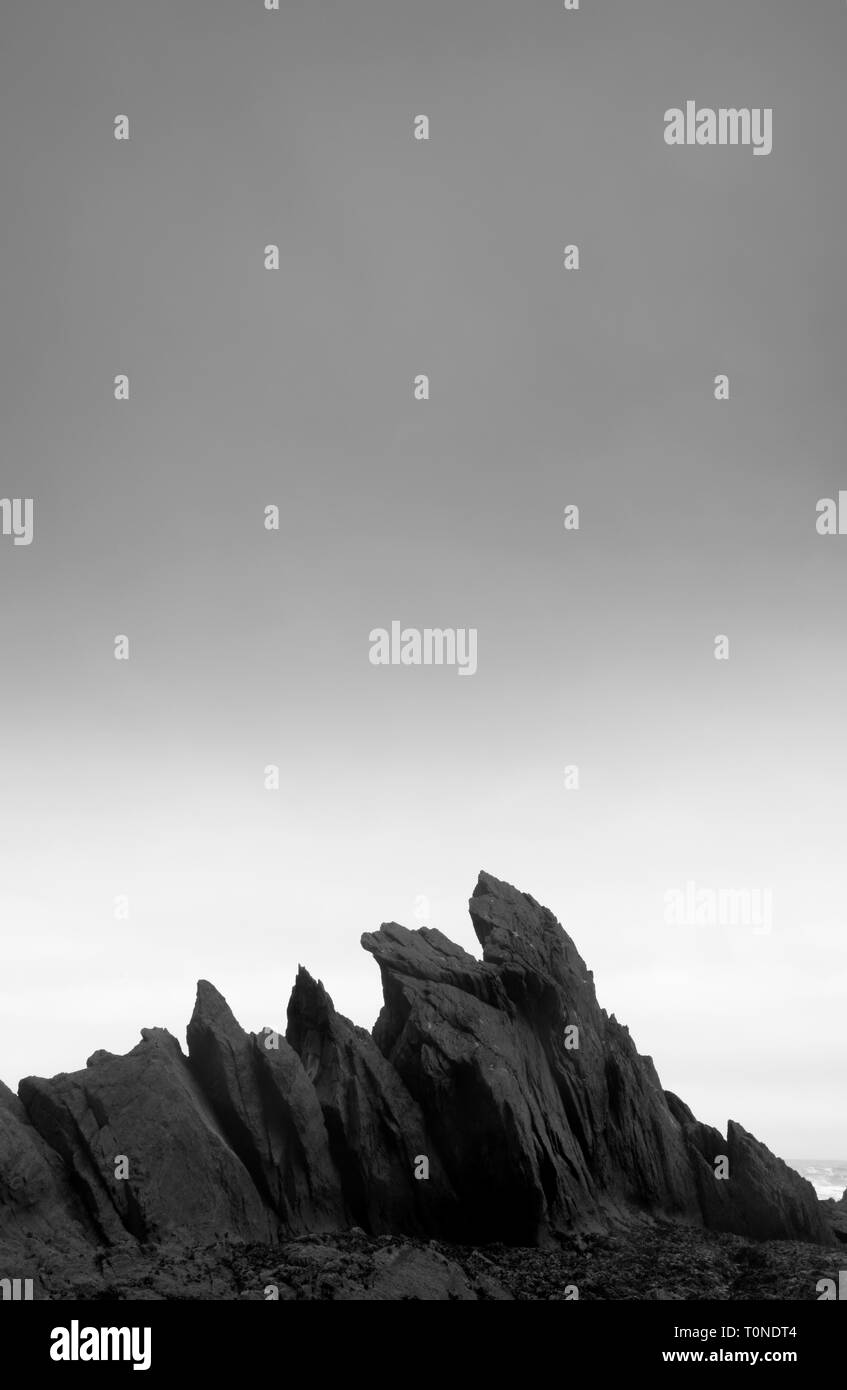 Sea stack on beach Black and White Stock Photos & Images - Alamy