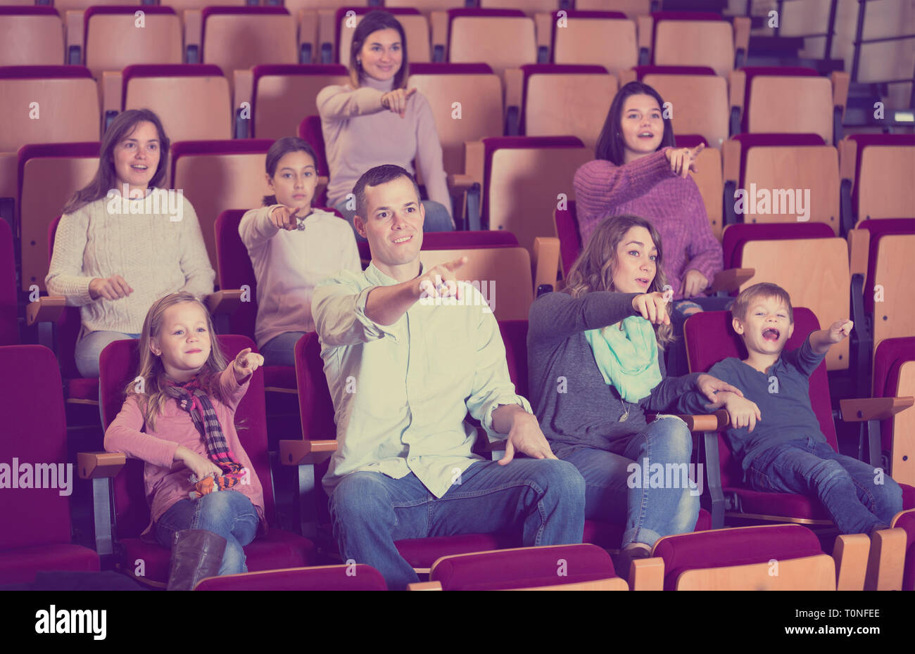 Audience attending movie night for adventure film in cinema Stock Photo ...