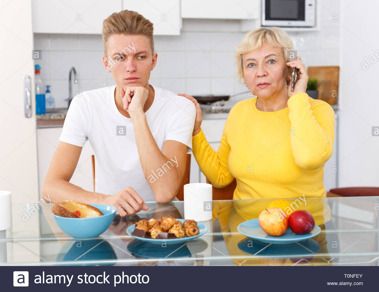 Two people 20s talking sad hi-res stock photography and images - Alamy