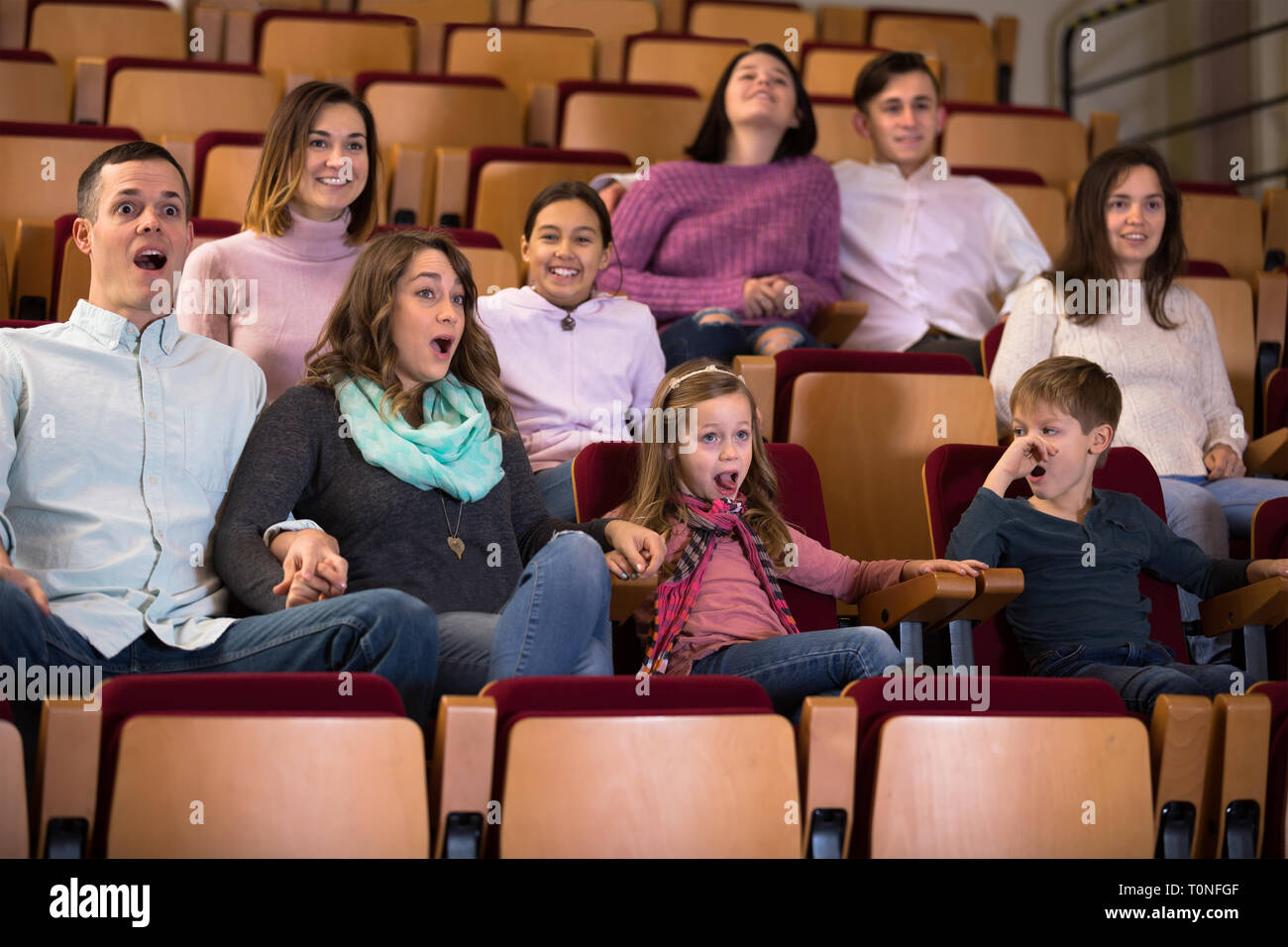 Audience attending movie night for adventure film in cinema Stock Photo ...