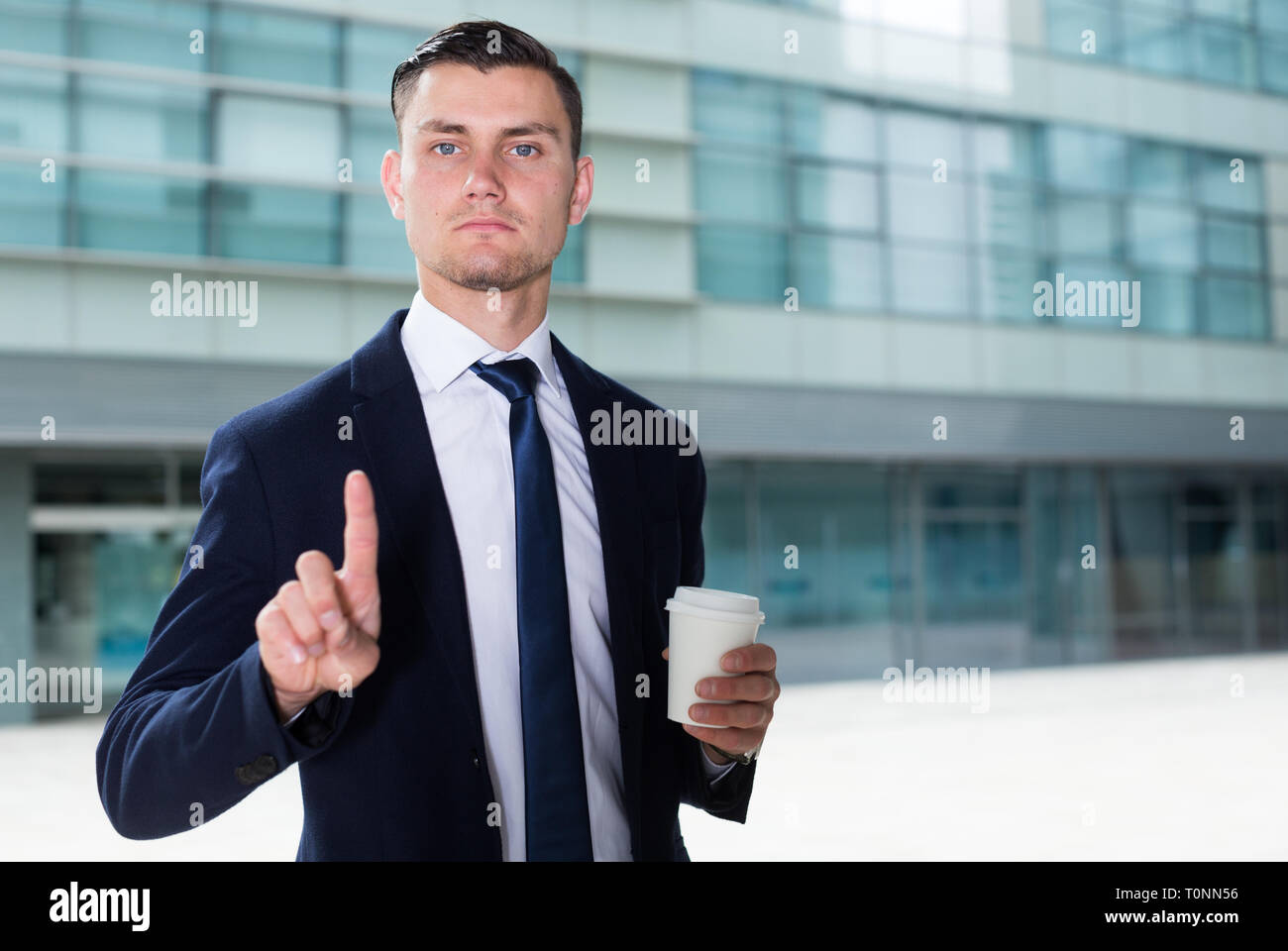 Office manager is asking companion to wait because he has a coffee ...