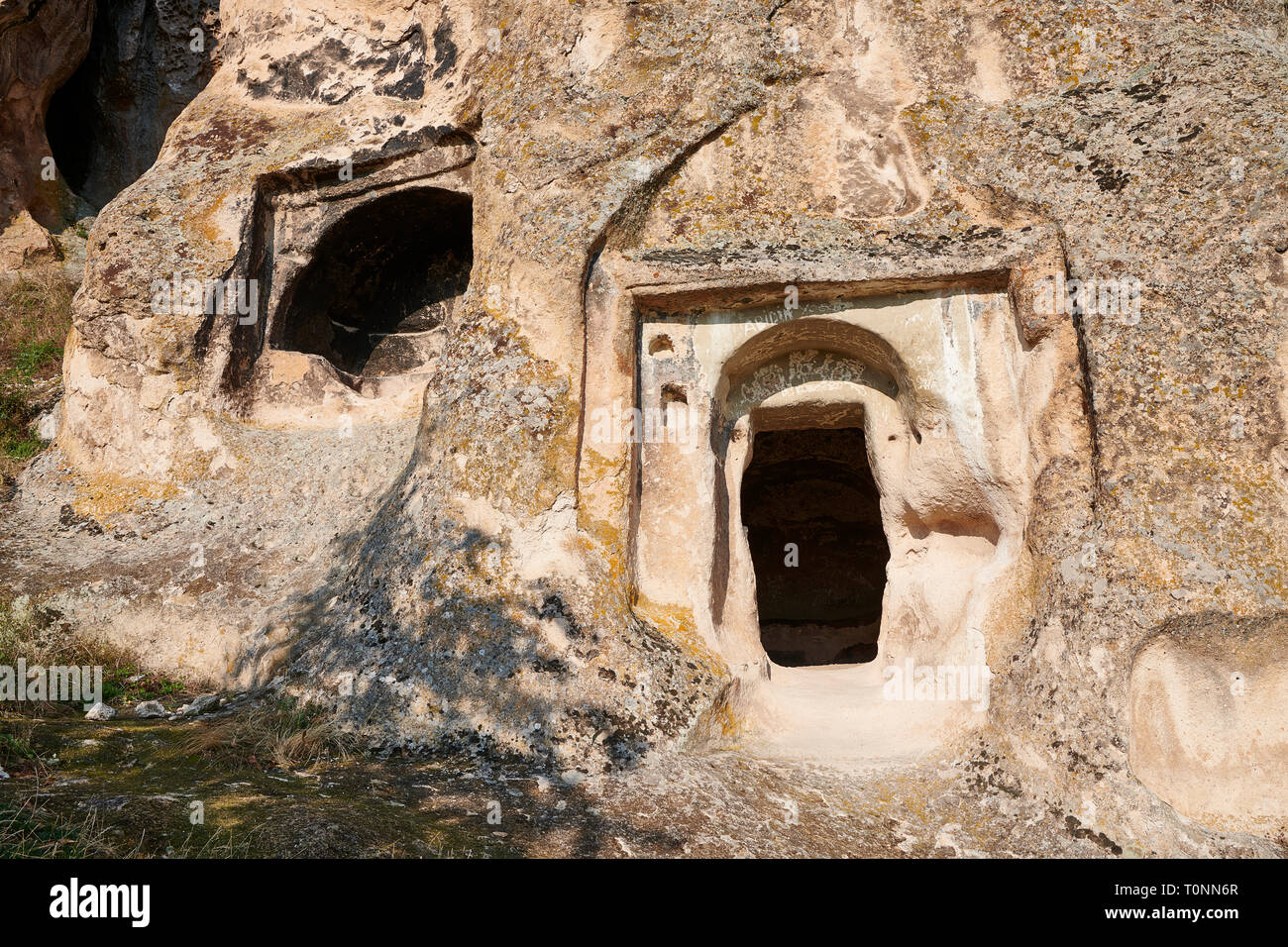 Close up of Phrygian rock tombs cut into the rocks faces protecting the ...