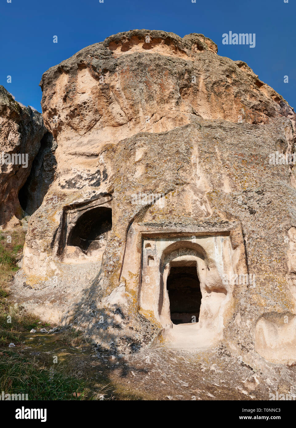 Phrygian and later rock tombs cut into the rocks faces protecting the ...