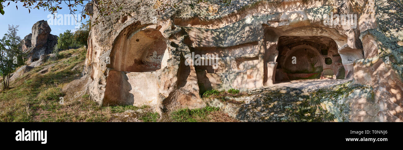 Close up of Phrygian rock tombs cut into the rocks faces protecting the ...