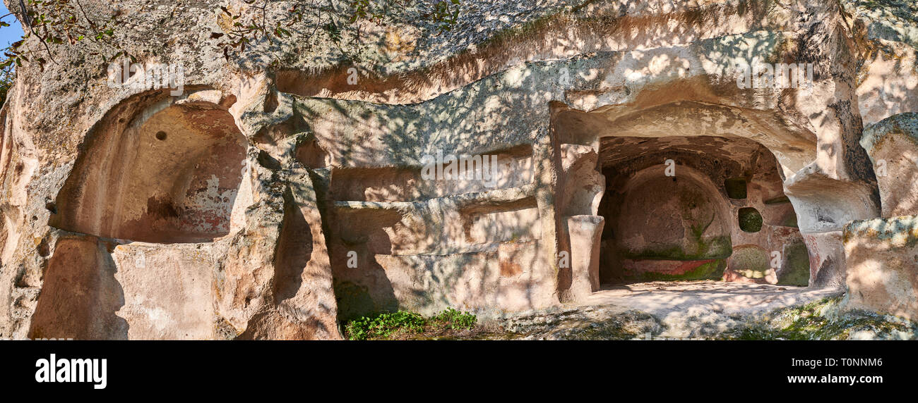 Close up of Phrygian rock tombs cut into the rocks faces protecting the ...