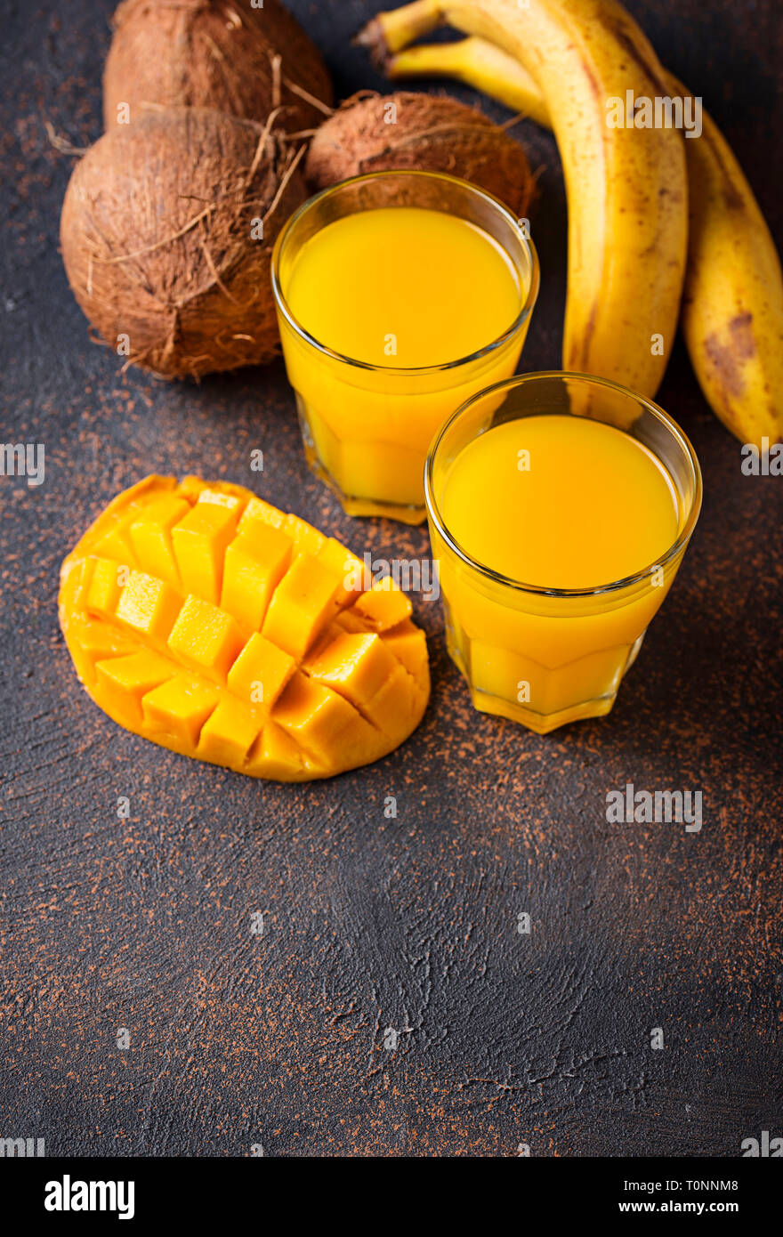 Fresh tropical mix fruit juice Stock Photo - Alamy