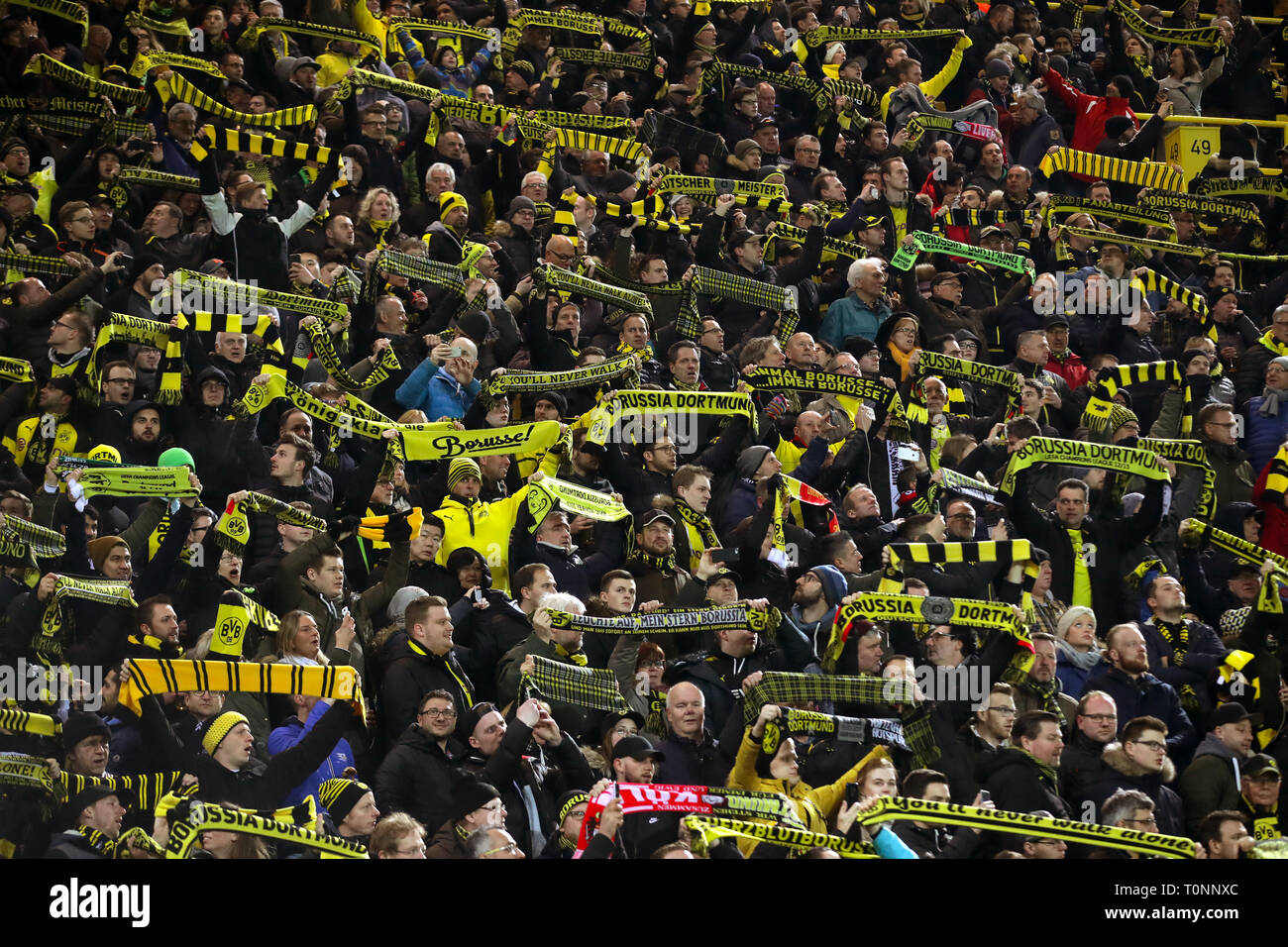 Borussia Dortmund fans in the stands show their support Stock Photo - Alamy