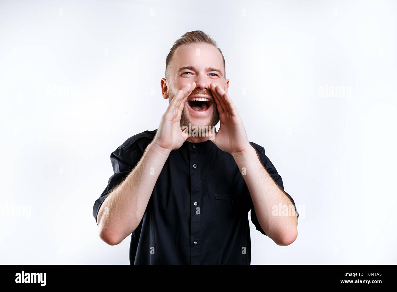 Young casual man shouting. Human emotions, facial expression concept ...