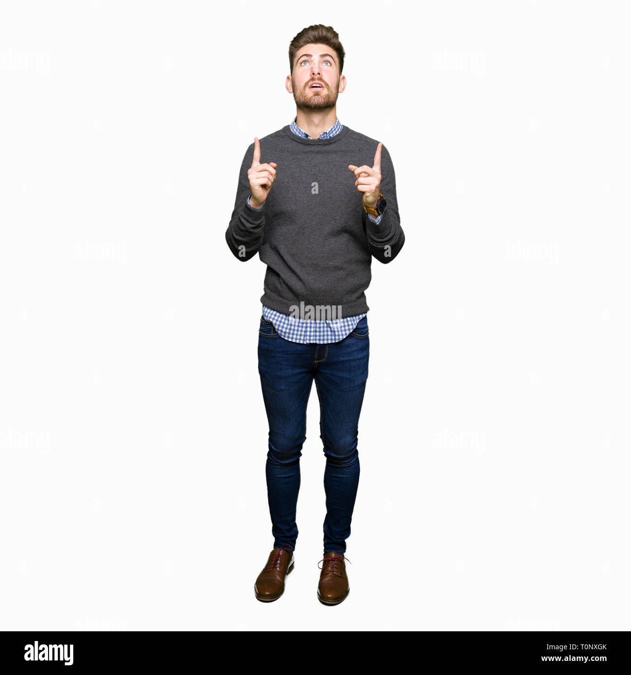 Surprised man pointing fingers show Cut Out Stock Images & Pictures - Alamy