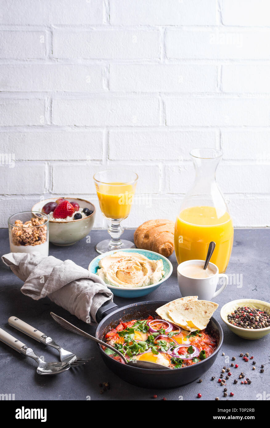 Breakfast with middle eastern and european food Stock Photo - Alamy