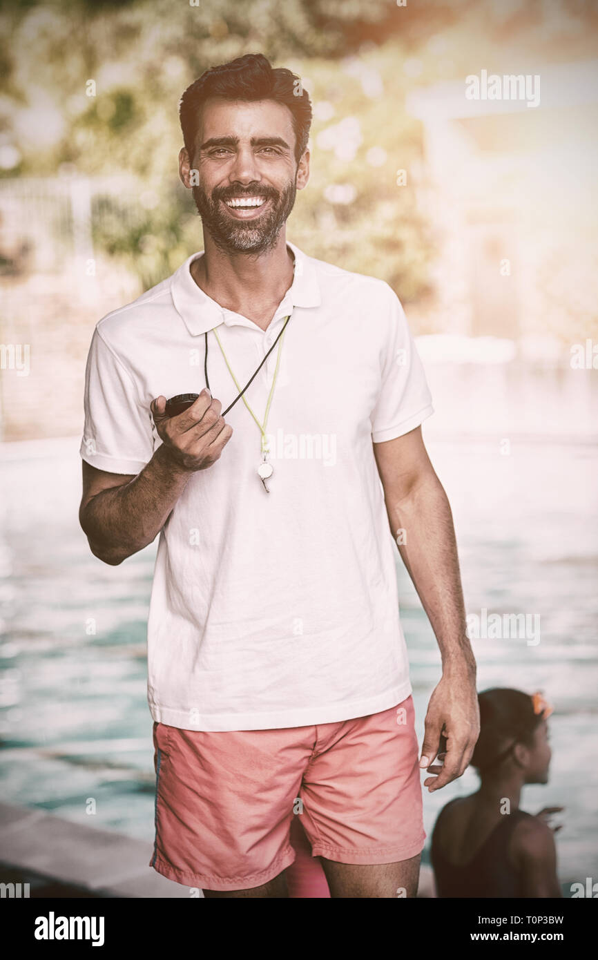 Happy coach standing hi-res stock photography and images - Alamy