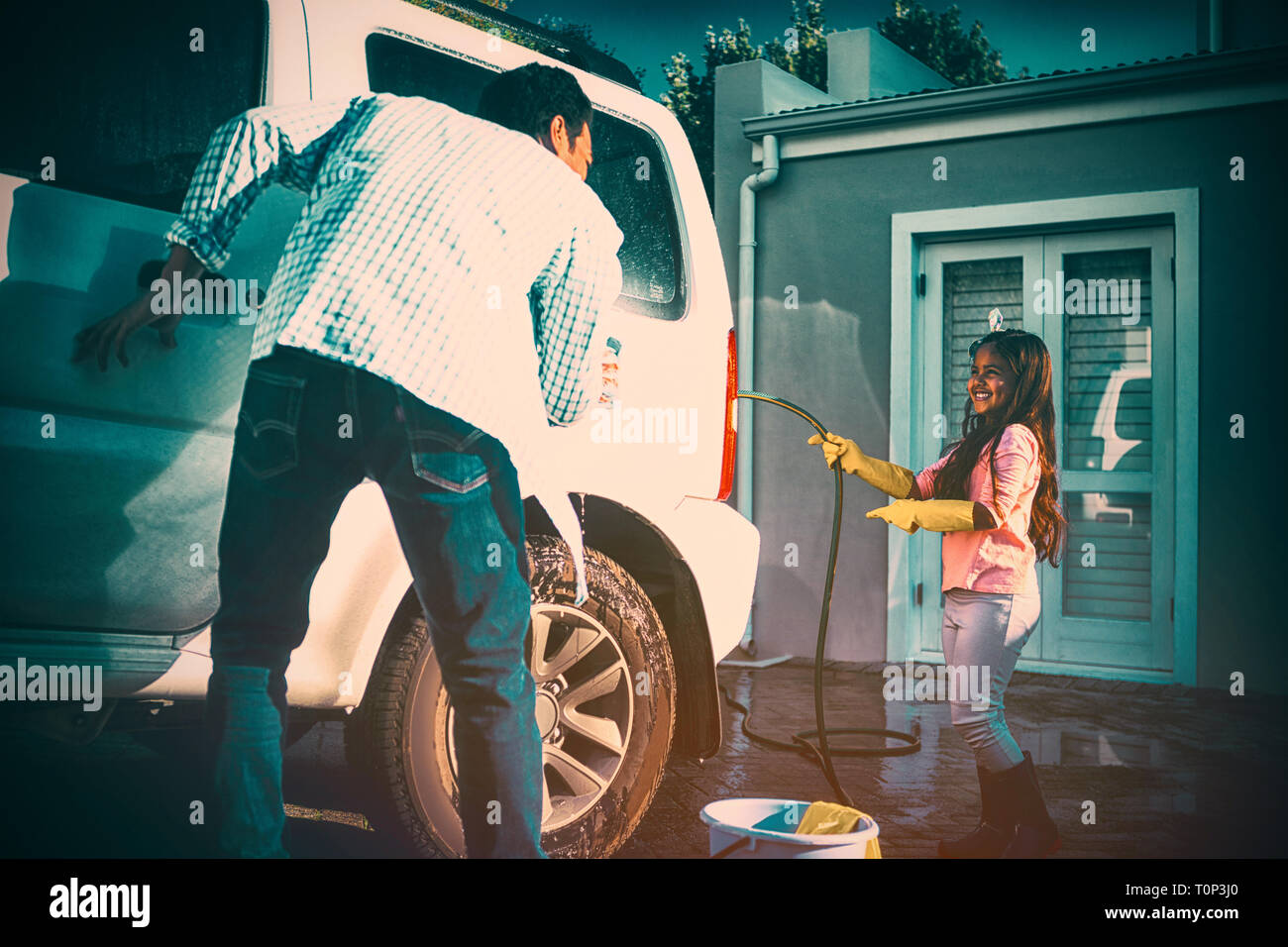 Child washing car bucket hi-res stock photography and images - Alamy