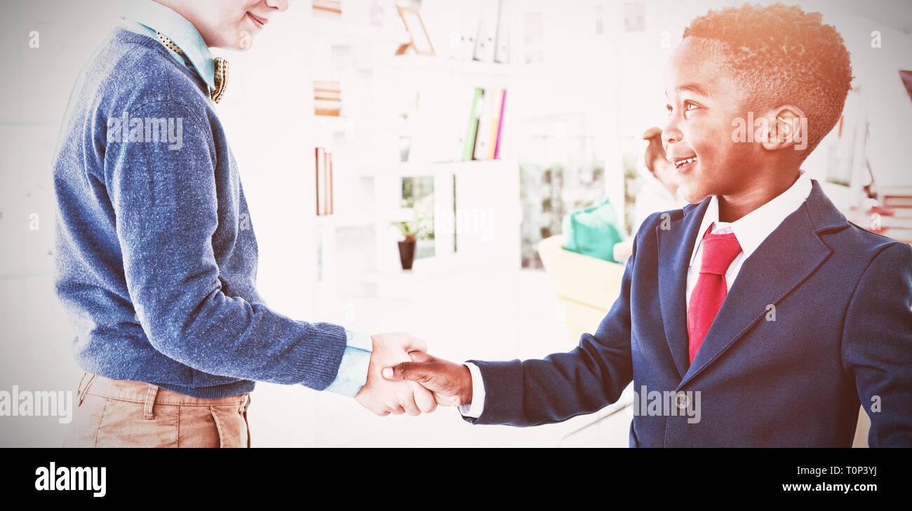 Child shaking hands hi-res stock photography and images - Alamy