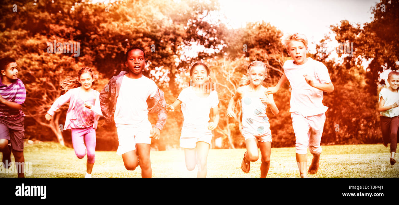 Kids playing together during a sunny day Stock Photo - Alamy