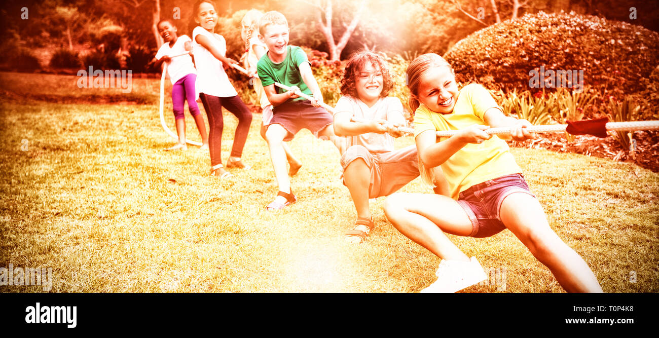 Children playing tug of war hi-res stock photography and images - Alamy