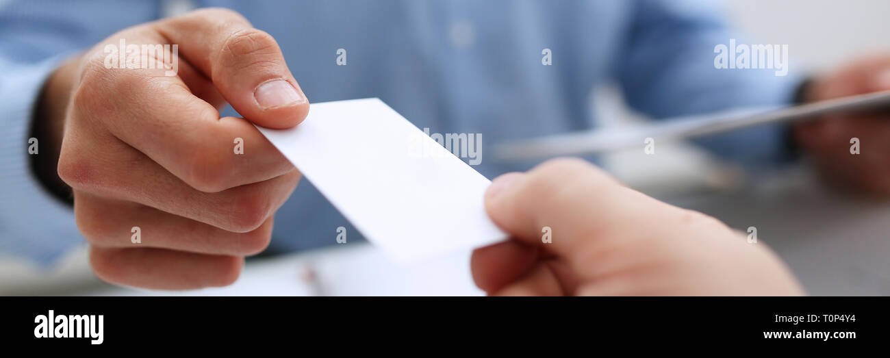 Male hand in suit give blank calling card Stock Photo - Alamy