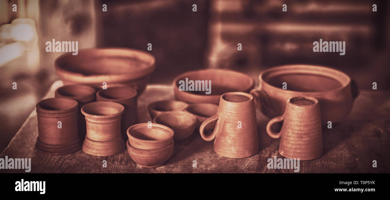 Various pottery on table Stock Photo - Alamy