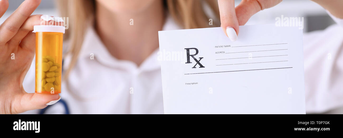 Female doctor hands hold prescription Stock Photo - Alamy