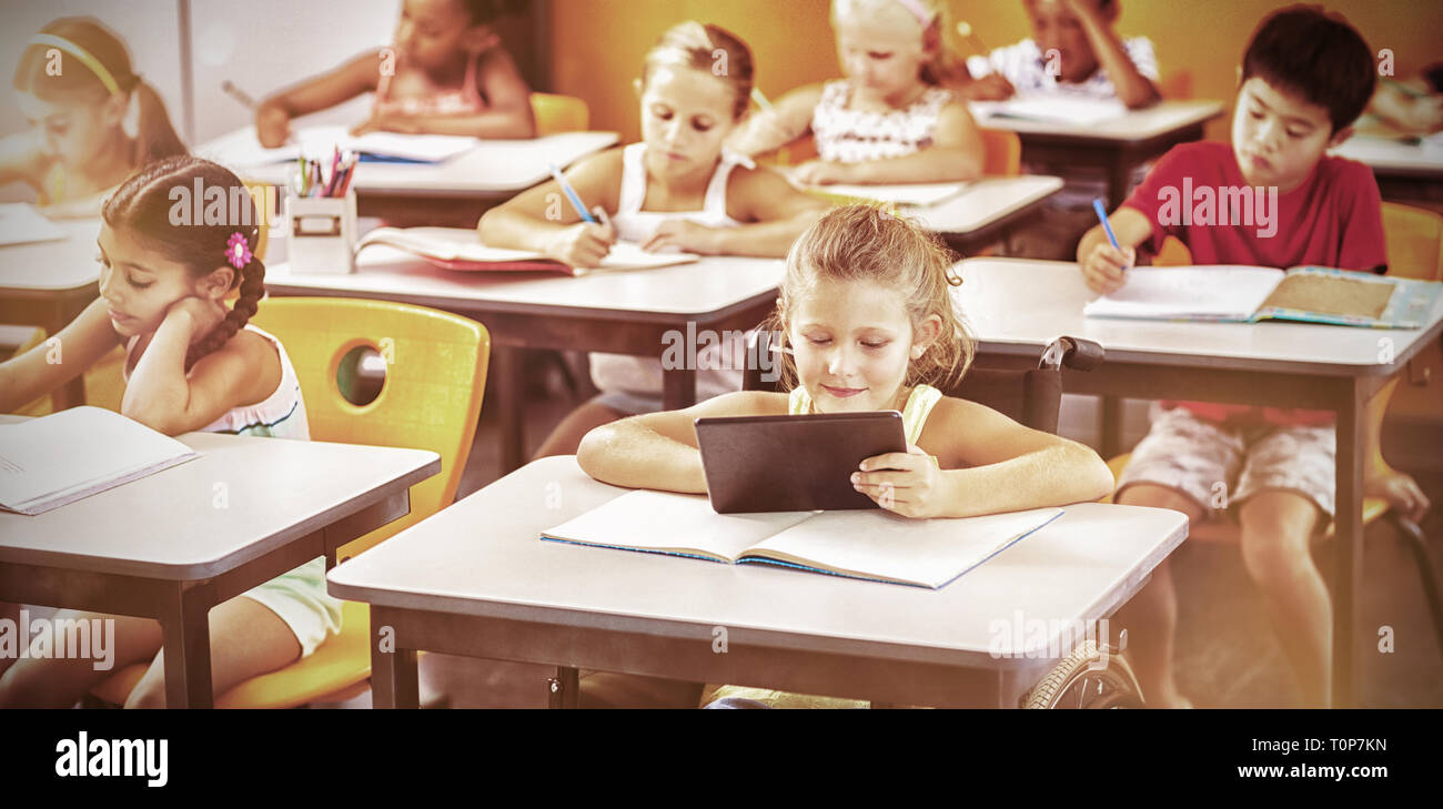 School kids studying in classroom Stock Photo - Alamy