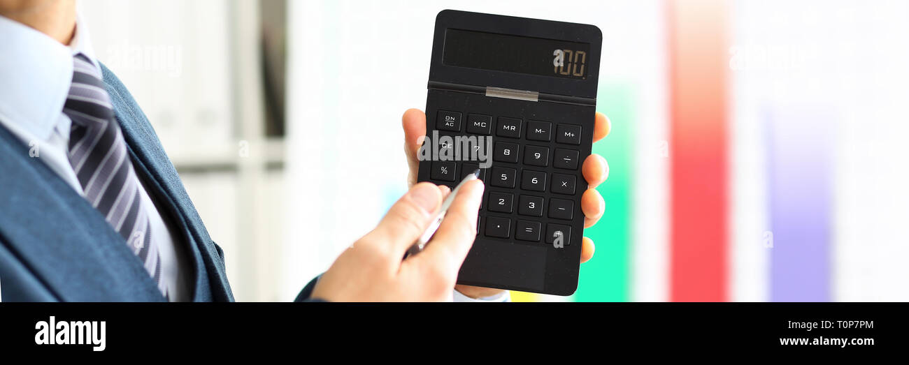 Hold calculator hi-res stock photography and images - Alamy