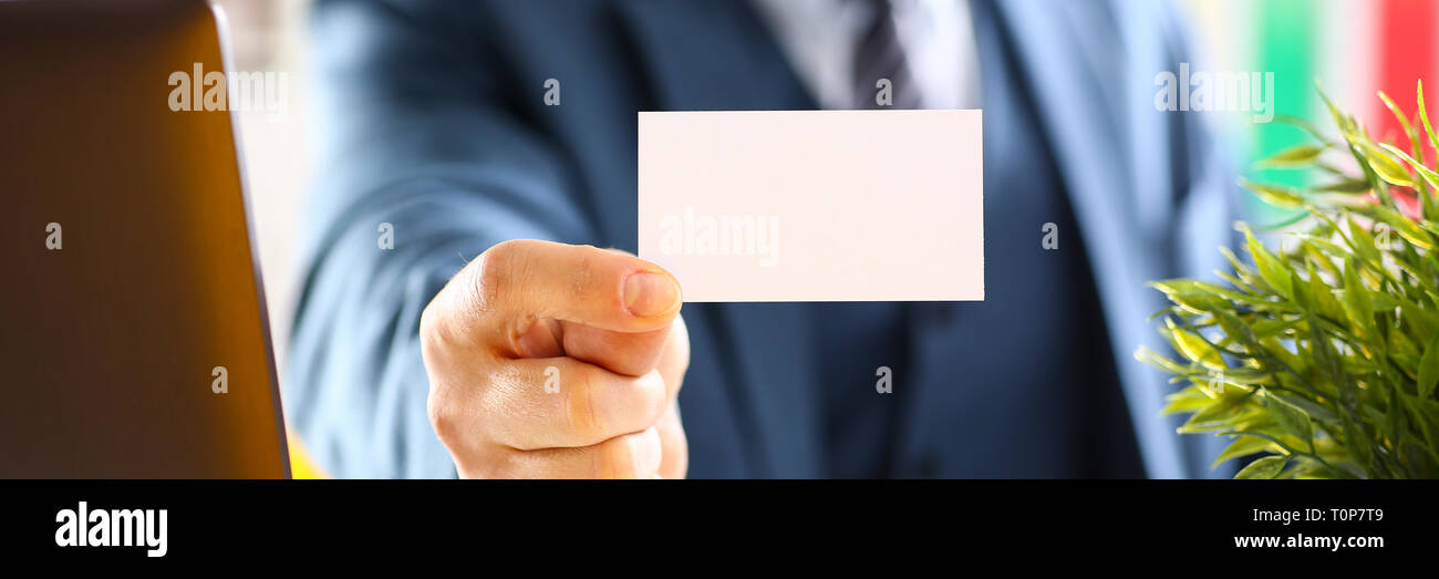 Male arm in suit give blank calling card Stock Photo - Alamy
