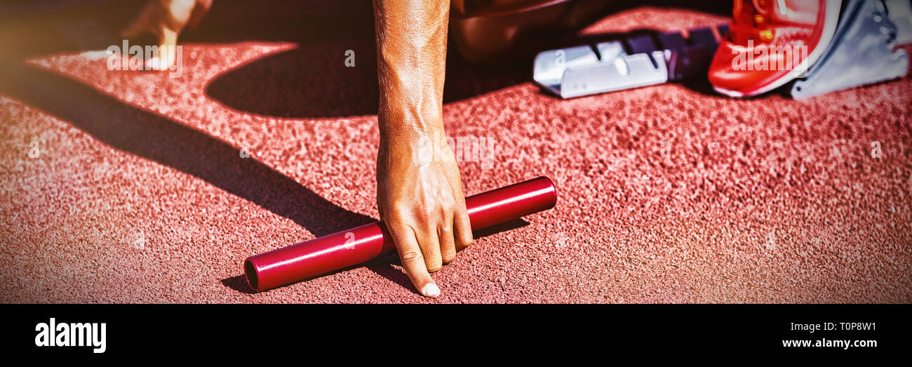 Relay race baton hi-res stock photography and images - Alamy