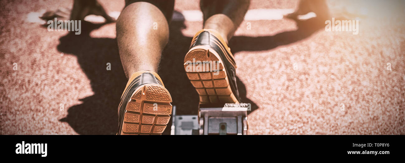 Starting block feet close up hi-res stock photography and images - Alamy