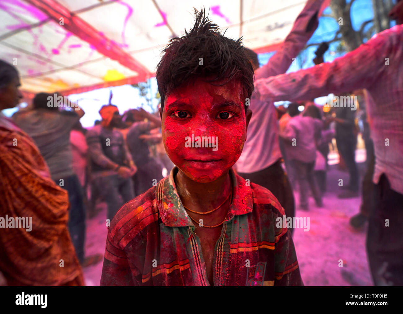 Mathura, Uttar Pradesh, India. 18th Mar, 2019. A colourful face of Holi ...