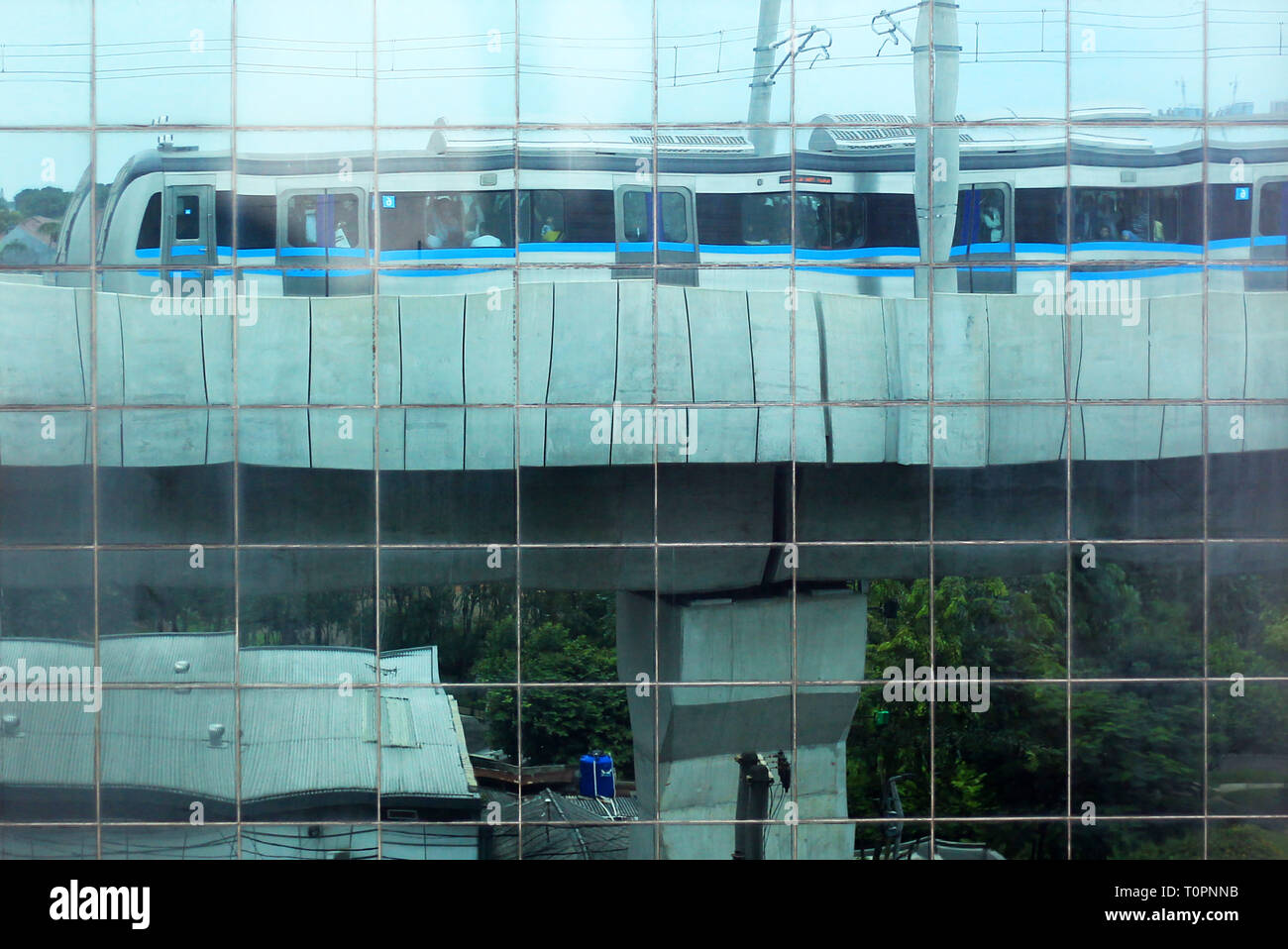 Jakarta, Indonesia. 21st Mar, 2019. Reflection of Mass Rapid Transit ...