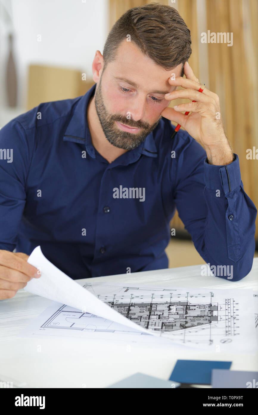 architect thinking of construction ideas Stock Photo - Alamy