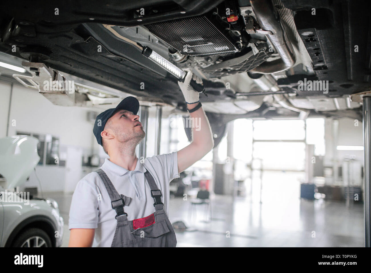 Underneath car hi-res stock photography and images - Alamy
