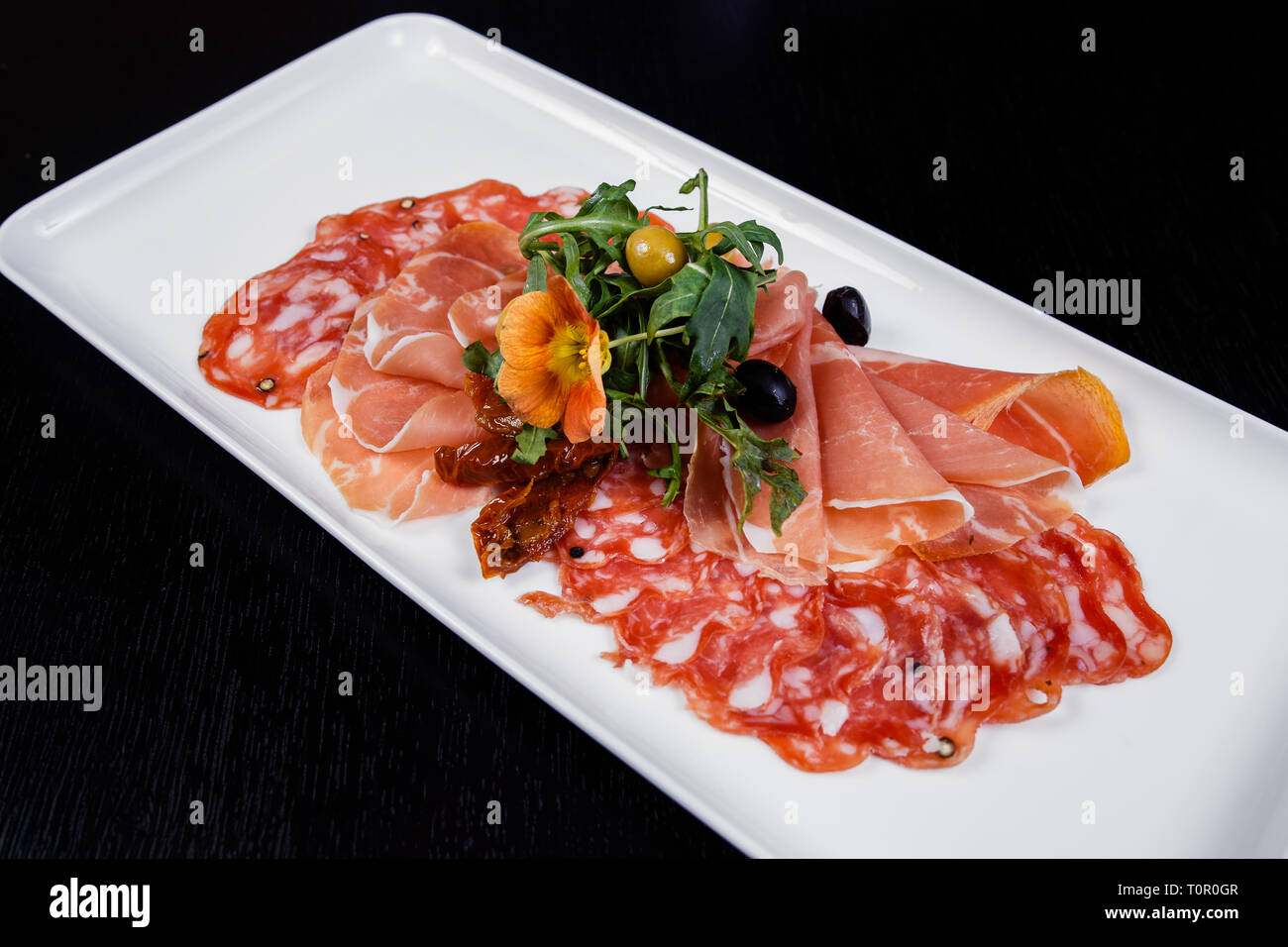 Italian salumi meat platter - prosciutto ham, bresaola, pancetta ...