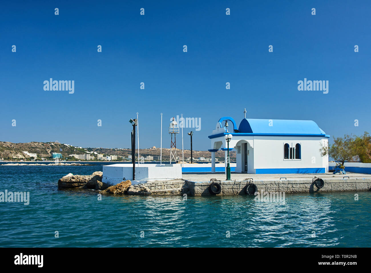 Orthodox chapel in the port of Faliraki town on the island of Rhodes ...